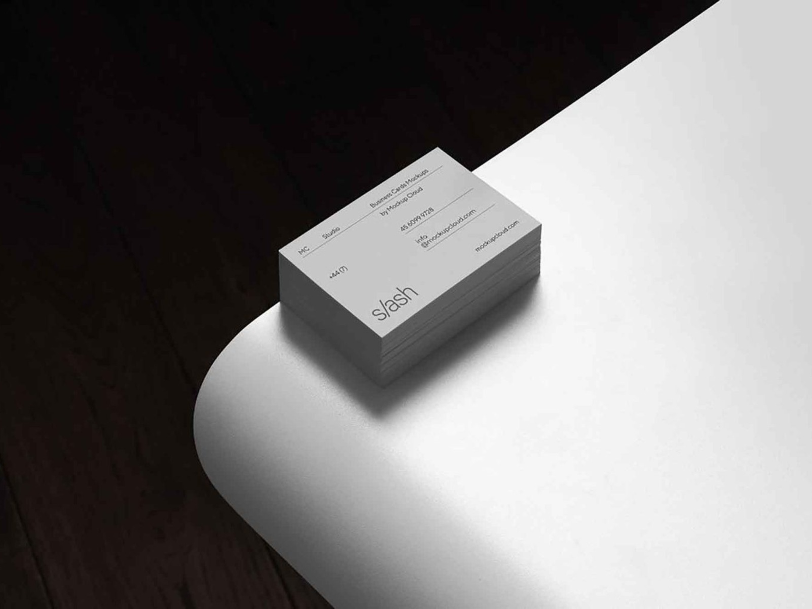 Free Curved Surface Business Card Stack PSD Mockup